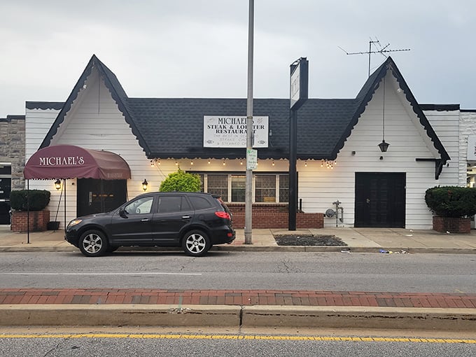 Michael's Steak & Lobster House stands like a humble guardian of culinary tradition. That burgundy awning has sheltered happy diners through decades of Baltimore history.