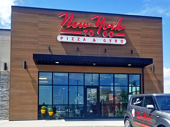 New York To Go's modern facade brings authentic Big Apple pizza vibes to Bismarck's suburban landscape. 