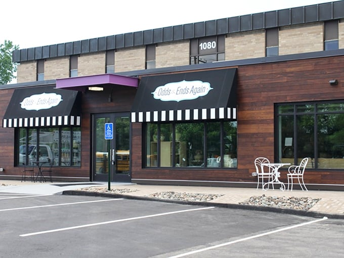 Odds & Ends Again's modern facade breaks the thrift store mold. The striped awnings add a boutique touch to secondhand shopping.