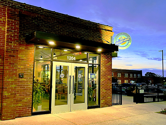 Ozark Mountain Biscuit & Bar glows invitingly at dusk. Modern design meets mountain comfort in this architectural handshake.