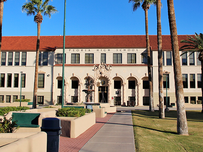 Peoria High School's Spanish Colonial Revival architecture stands as a testament to educational pride. Those palm trees provide perfect exclamation points!