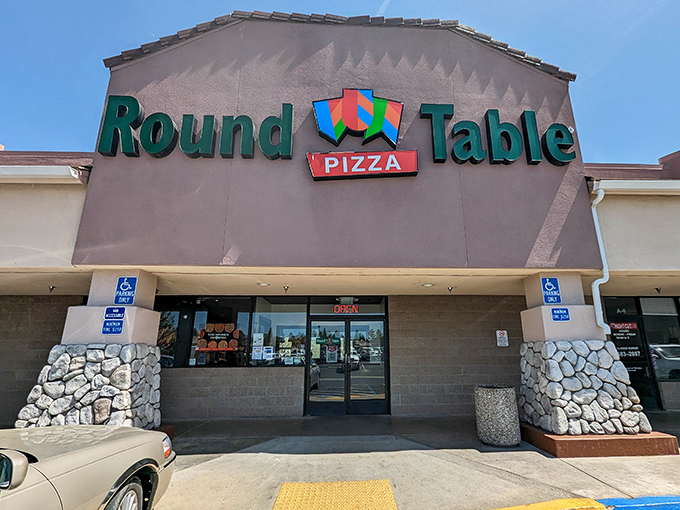 Round Table Pizza's stone-accented building stands ready to serve hungry Yosemite visitors and Oakhurst locals alike.