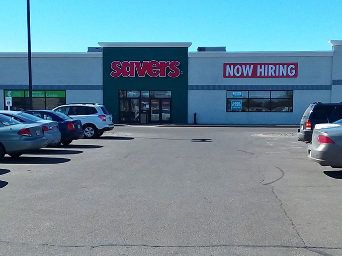 Savers' bold red sign against the white building &ndash; like a bullseye for bargain hunters with a keen eye.