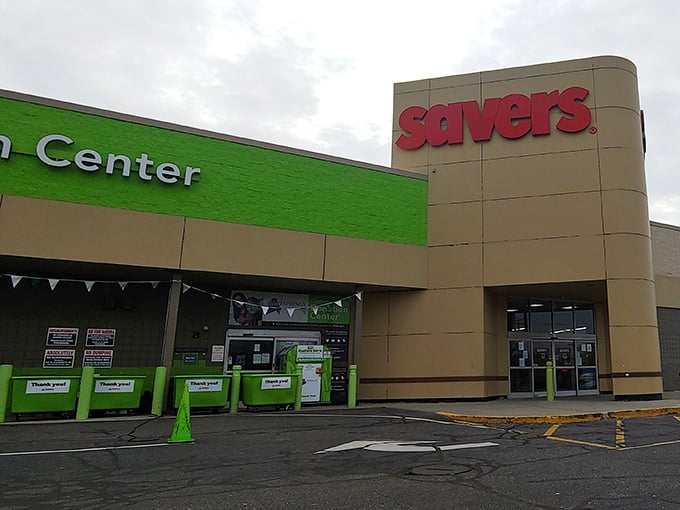 The prominent donation center and organized exterior suggest this Orange location takes the "reduce, reuse, recycle" mission seriously.