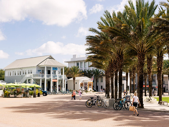 Seaside&rsquo;s lively town center blends coastal charm with walkable design, where palm-lined plazas invite visitors to shop, dine, and pedal toward the nearby beach.