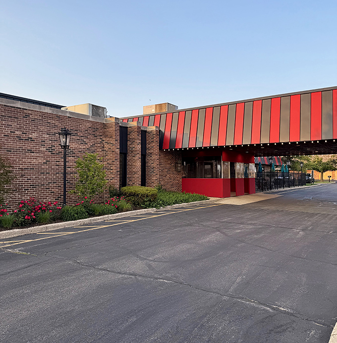 St. Charles Place's bold red awning signals serious business inside. No frills, no fuss&mdash;just the focus on what matters.