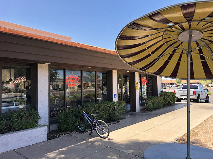 Ted's charming building with its distinctive striped umbrella tables has been making hot dog lovers smile for years.