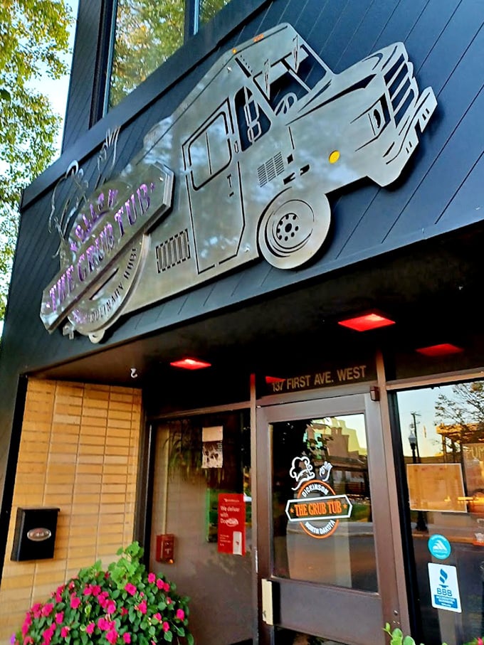 The Grub Tub's metal food truck sign gives a modern wink to BBQ's street food roots. Clever and appetizing!