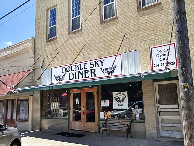 The green awning and classic signage of Double Sky Diner create instant nostalgia. A slice of Americana served with a side of Texas hospitality!