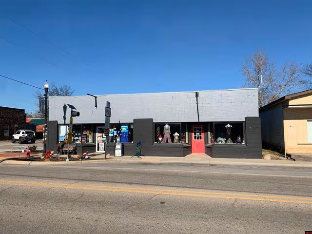 This unassuming storefront in Flippin represents the town's approach to commerce&mdash;straightforward, honest, and affordable.