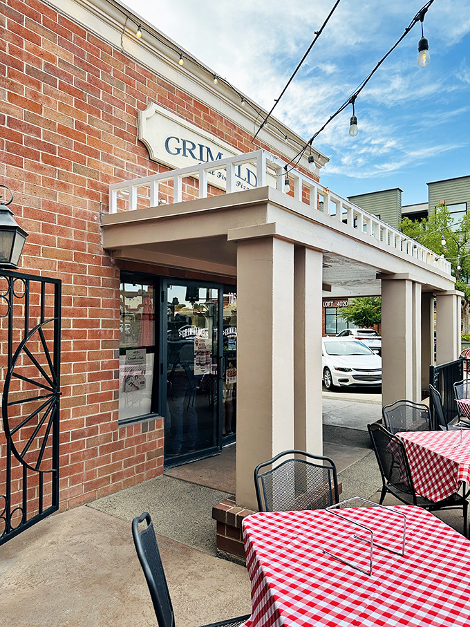 Red checkered tablecloths and string lights create pizza magic at Grimaldi's. Brooklyn tradition meets Scottsdale sophistication.