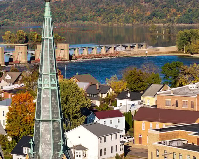 The church spire stands sentinel over Guttenberg's rooftops, while the mighty Mississippi flows past this postcard-perfect river town.