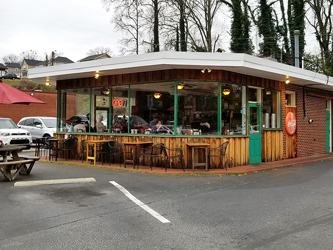 The covered porch at Henry's invites you to stay awhile. Where every meal feels like a backyard barbecue with friends.