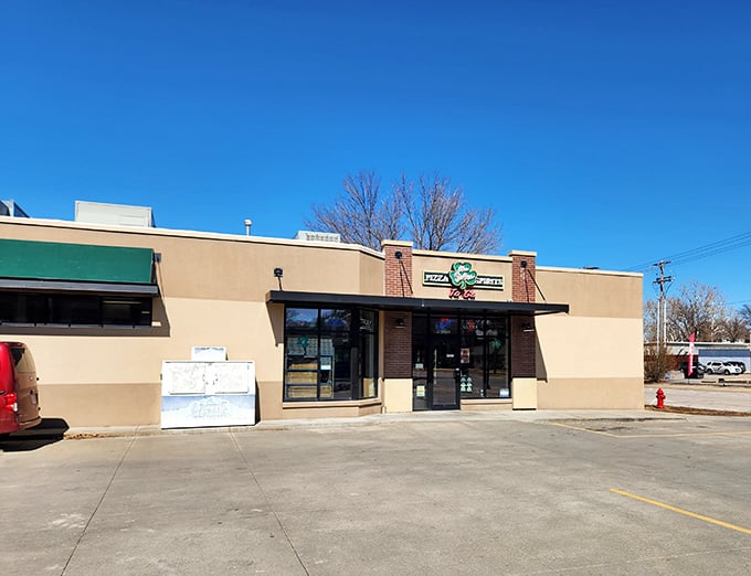 The unassuming exterior of Isles gives no hint of the pizza paradise within. Talk about hiding your light under a bushel!