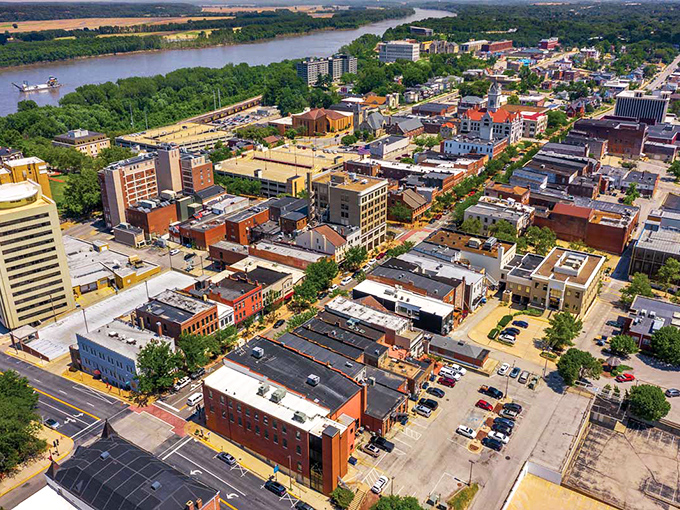 The mighty Missouri River cradles Jefferson City in a gentle embrace. Where government buildings and small-town charm create an unexpected harmony.