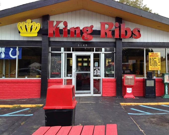 The bright red brick of King Ribs stands out like a beacon of BBQ hope in a hungry world. That crown isn't just for show!