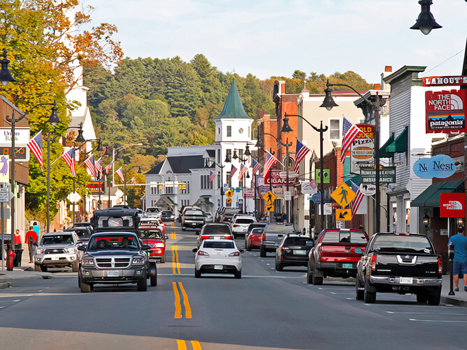American flags line Littleton's picturesque downtown, where mountain views come standard with some of New Hampshire's most reasonable living costs.