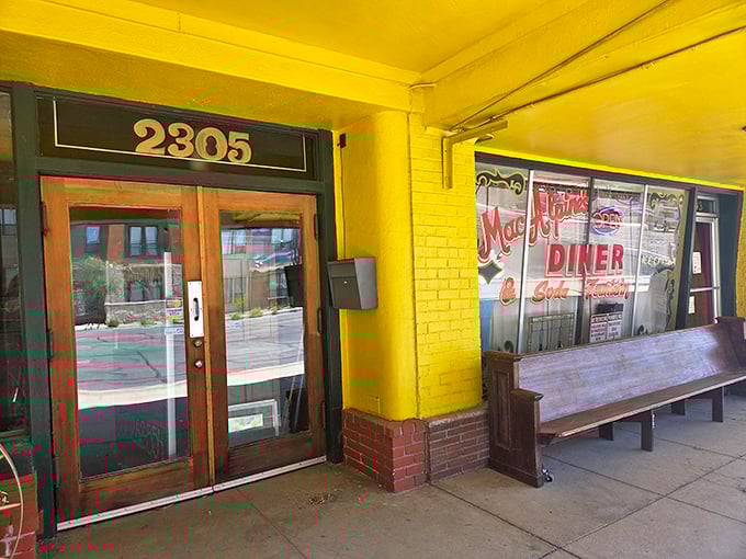 That cheerful yellow entrance and wooden bench invite you to slow down and savor MacAlpine's old-fashioned treats.