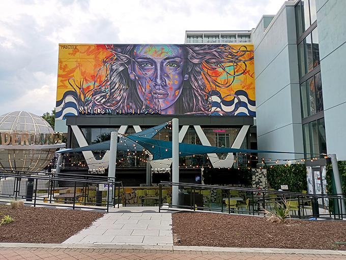 That colorful street art promises the kind of creative pizza experience that feeds both your stomach and soul.