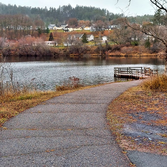 Lakeside serenity captured in autumn's golden embrace, where time moves at fishing speed.