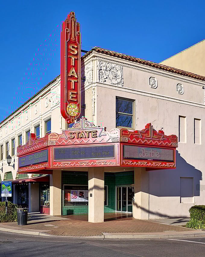 Historic State Theatre neon welcomes visitors to entertainment priced like the good old days.