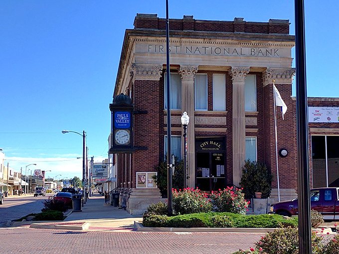 Pauls Valley's historic First National Bank building now serves as City Hall, its classical columns and street clock standing as proud reminders of small-town prosperity.