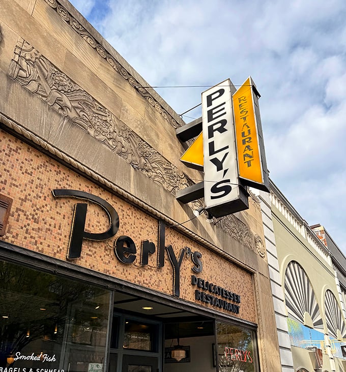 That yellow and black sign stands proud on Grace Street, pointing hungry folks toward deli perfection since Richmond learned what good pastrami means.