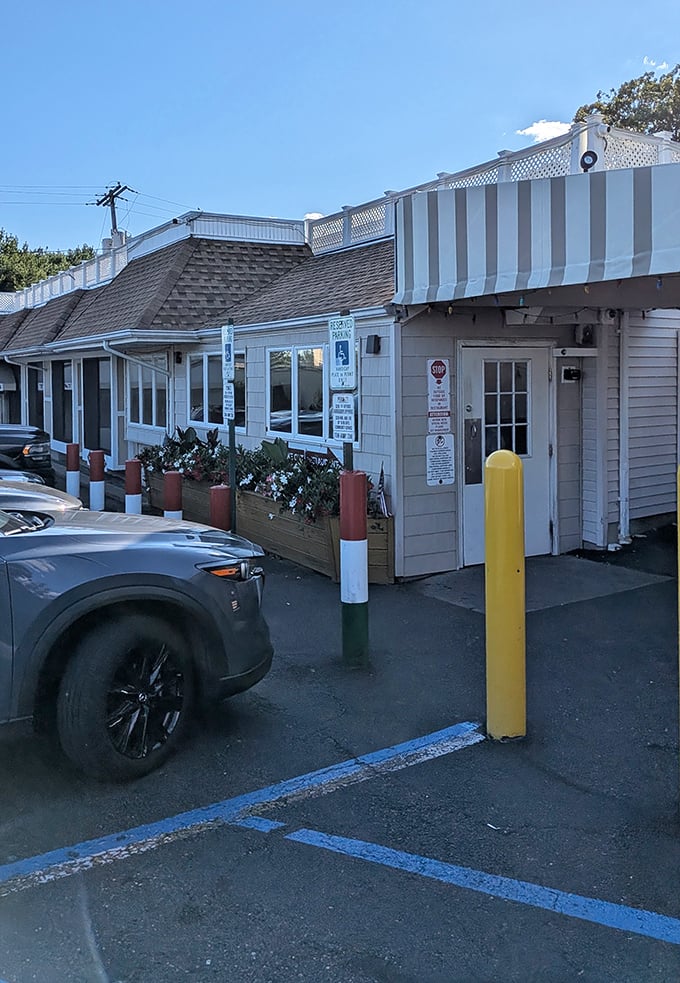 That striped awning and casual vibe hint at the kind of authentic bar pizza legends are made of.