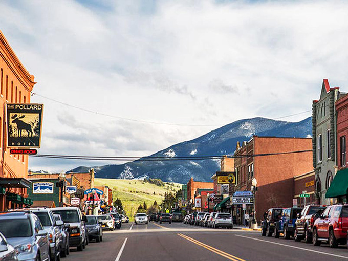 Red Lodge's vibrant main street invites exploration with the dramatic Beartooth Mountains creating a perfect backdrop.