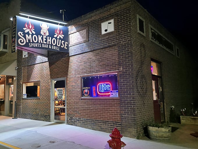 That welcoming wooden facade promises cold drinks, good times, and BBQ that'll make you forget all about the score.