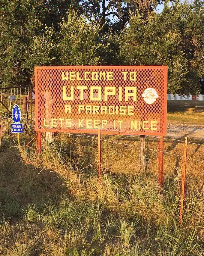 A welcoming sign promises paradise in this peaceful valley where the Sabinal River runs cold and clear.