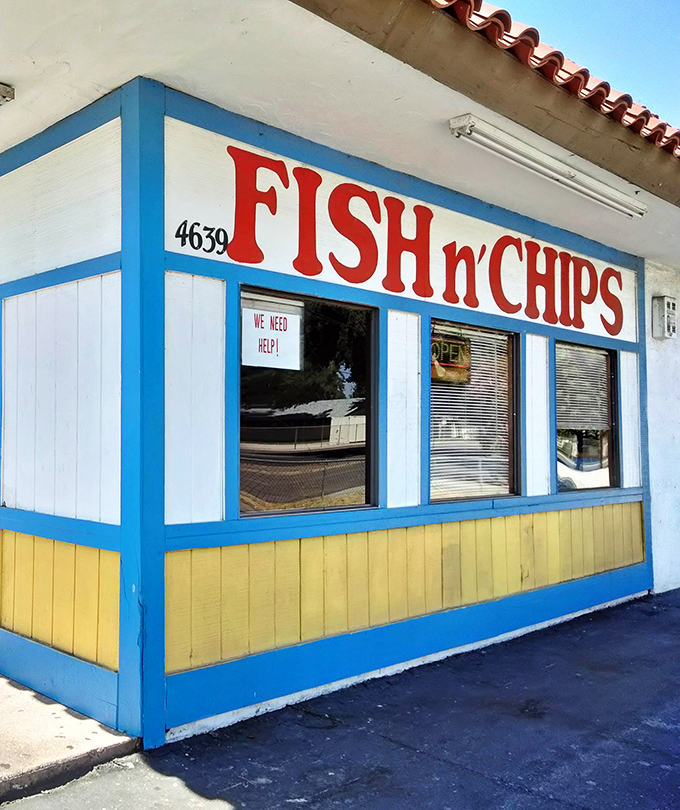 Bold red lettering announces "FISH n'CHIPS" to hungry Fresno residents. No ocean needed when the flavor's this good.