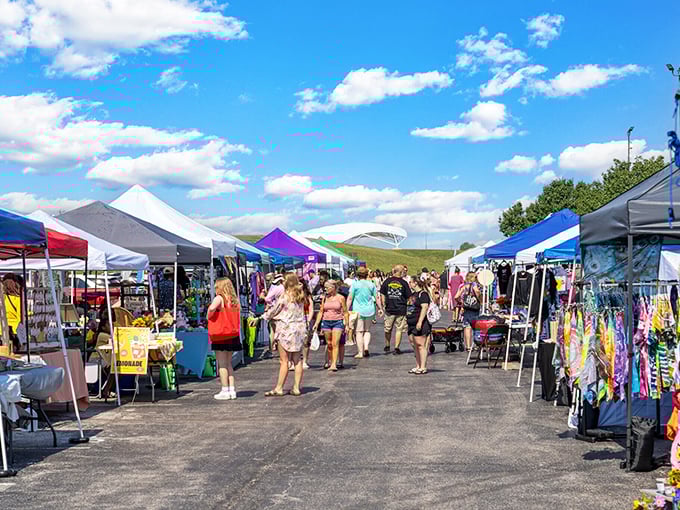 The farmers market buzzes with the energy of community commerce &ndash; where shopping isn't a chore but a weekly social event.