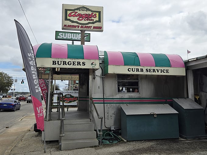 Angel's Diner, Florida's oldest diner, serves nostalgia alongside burgers with its classic pink and green awning beckoning hungry time travelers.
