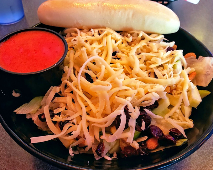 The Apple Nut Salad proves healthy-adjacent eating can be exciting&mdash;a symphony of crisp, sweet, and tangy notes topped with a snowcap of shredded cheese.