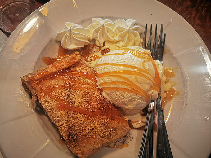 Apple strudel with ice cream&mdash;where warm meets cold in dessert harmony. The cinnamon-sugar topping is like edible fairy dust for grown-ups.