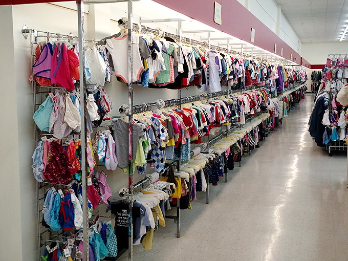 The children's clothing section is a parent's financial salvation. Kids outgrow clothes faster than ice cream melts in July, making this aisle pure economic genius. 