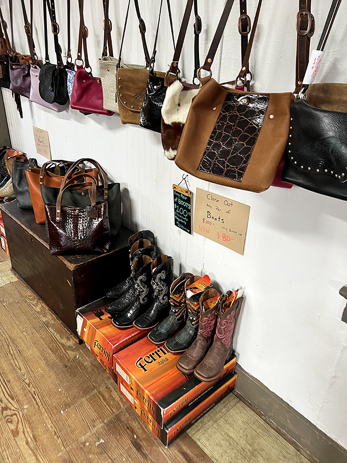 Leather goods hang in patient rows, waiting for the right shopper. These aren't mass-produced mall bags; they're handcrafted companions for life's adventures.