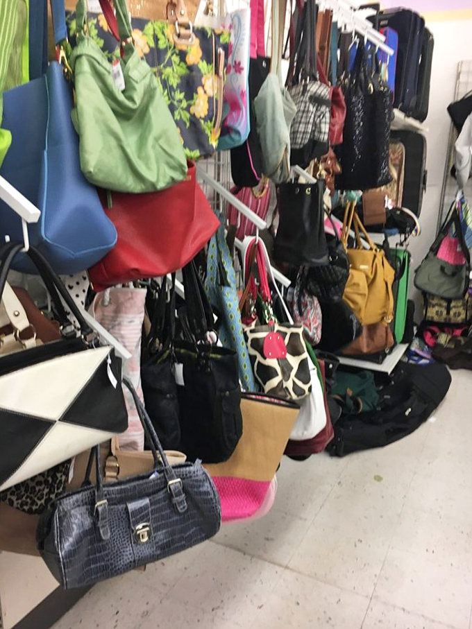 The handbag corner—where designer lookalikes and genuine vintage finds hang together in democratic fashion harmony.