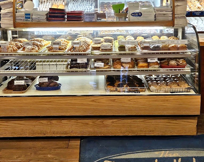 The pastry case&mdash;a museum of edible art where each shelf displays masterpieces that belong in the Louvre of Breakfast.