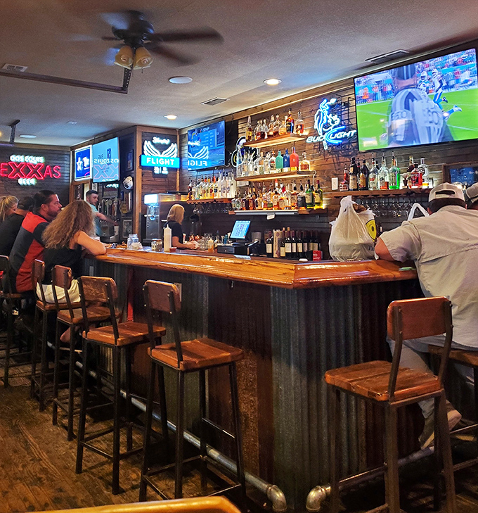 The bar at Johnny's isn't trying to reinvent cocktails; it's perfecting the classics while you watch the game with newfound friends.