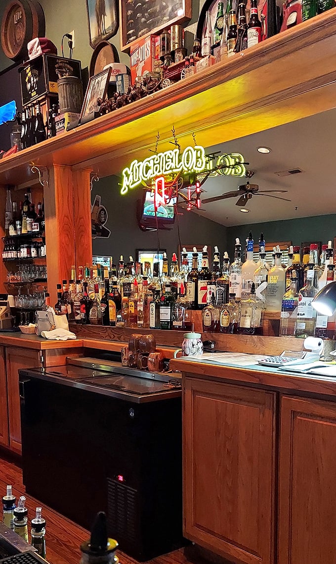 The bar at The Steak Inn isn't trying to be trendy – it's confidently classic, like a well-aged bourbon or your favorite leather jacket.