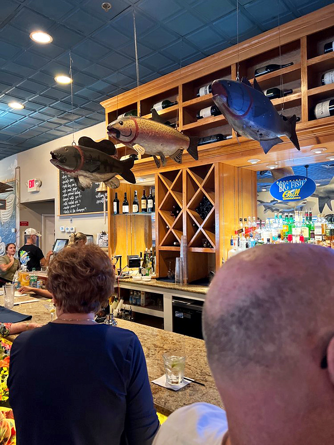 At this bar, fish stories are encouraged and probably true. The mounted catches overhead serve as silent witnesses to coastal conversations.