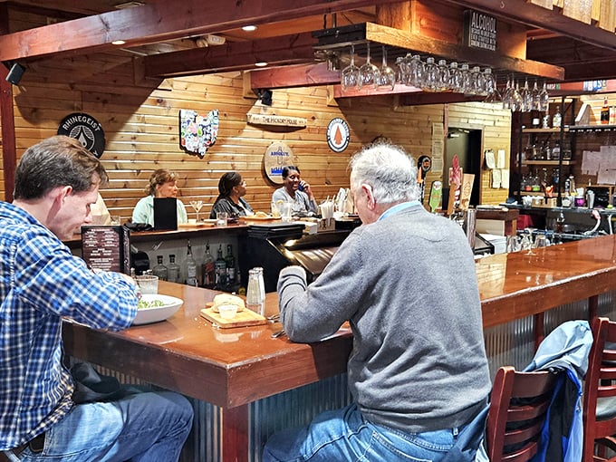 The bar area feels like the living room of a mountain lodge, where regulars and newcomers alike find common ground over exceptional drinks.