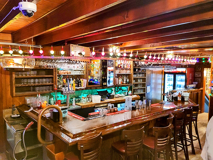 The bar area looks like Santa's workshop collided with a classic Hollywood set, creating the perfect spot to sip something festive year-round.