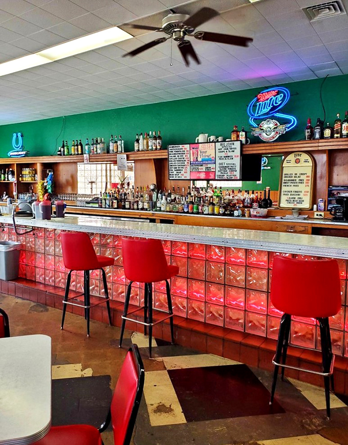 The bar area glows with decades of good times and cold beers. Those red stools have heard every story Indianapolis has to offer.