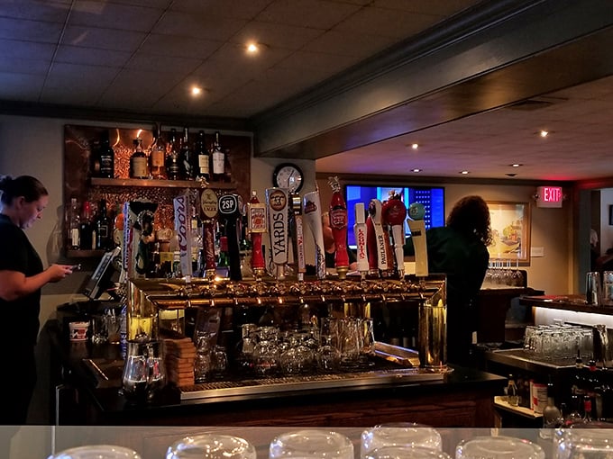 The bar area hums with conversation and possibility, where bartenders pour with precision and locals share the day's stories.
