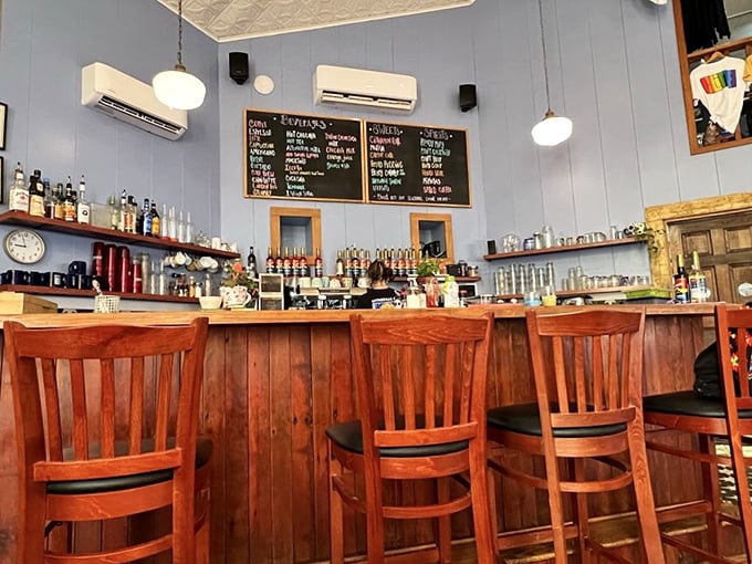 The wooden bar area feels like the world's coziest library that happens to serve excellent coffee and stronger spirits when the occasion calls. 