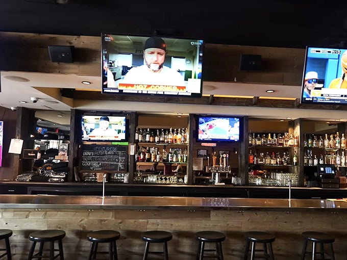 The bar area at Bludso's offers front-row counter seats to the scenes on the screens of LA life, with barbecue as the perfect companion to people-watching
