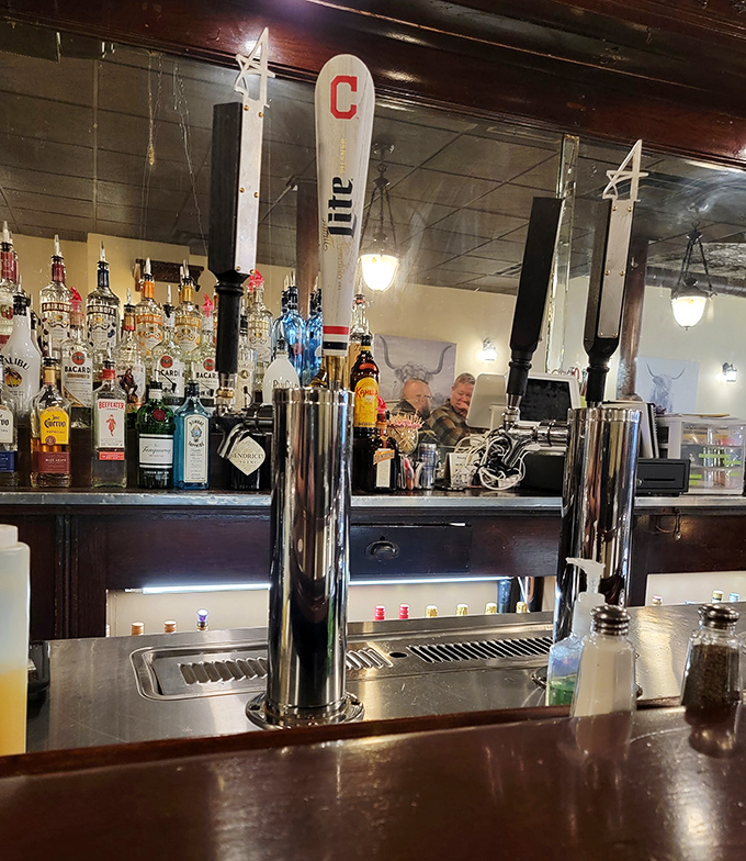 The bar's tap handles include a Cleveland ski—because nothing pairs better with a good steak than local pride on draft.